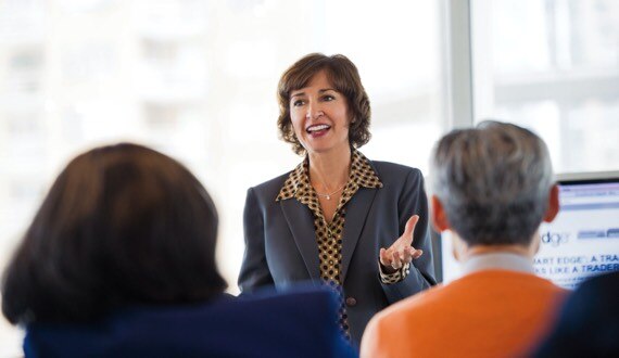 Woman addressing students | Advisor Services